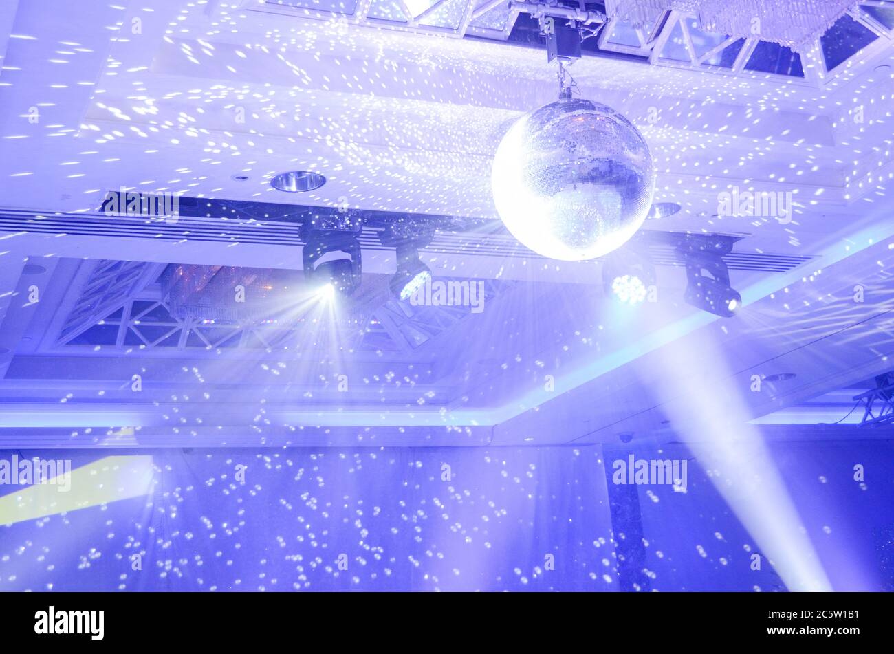 Disco ball reflecting light during the dance Stock Photo - Alamy