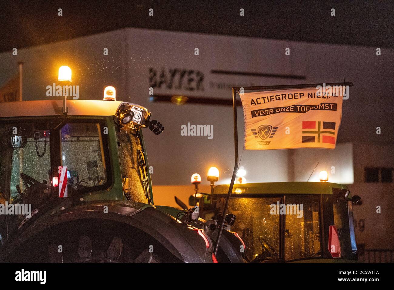 HEERENVEEN, NETHERLANDS - JULY 4: Blockade of the road with tractors ...
