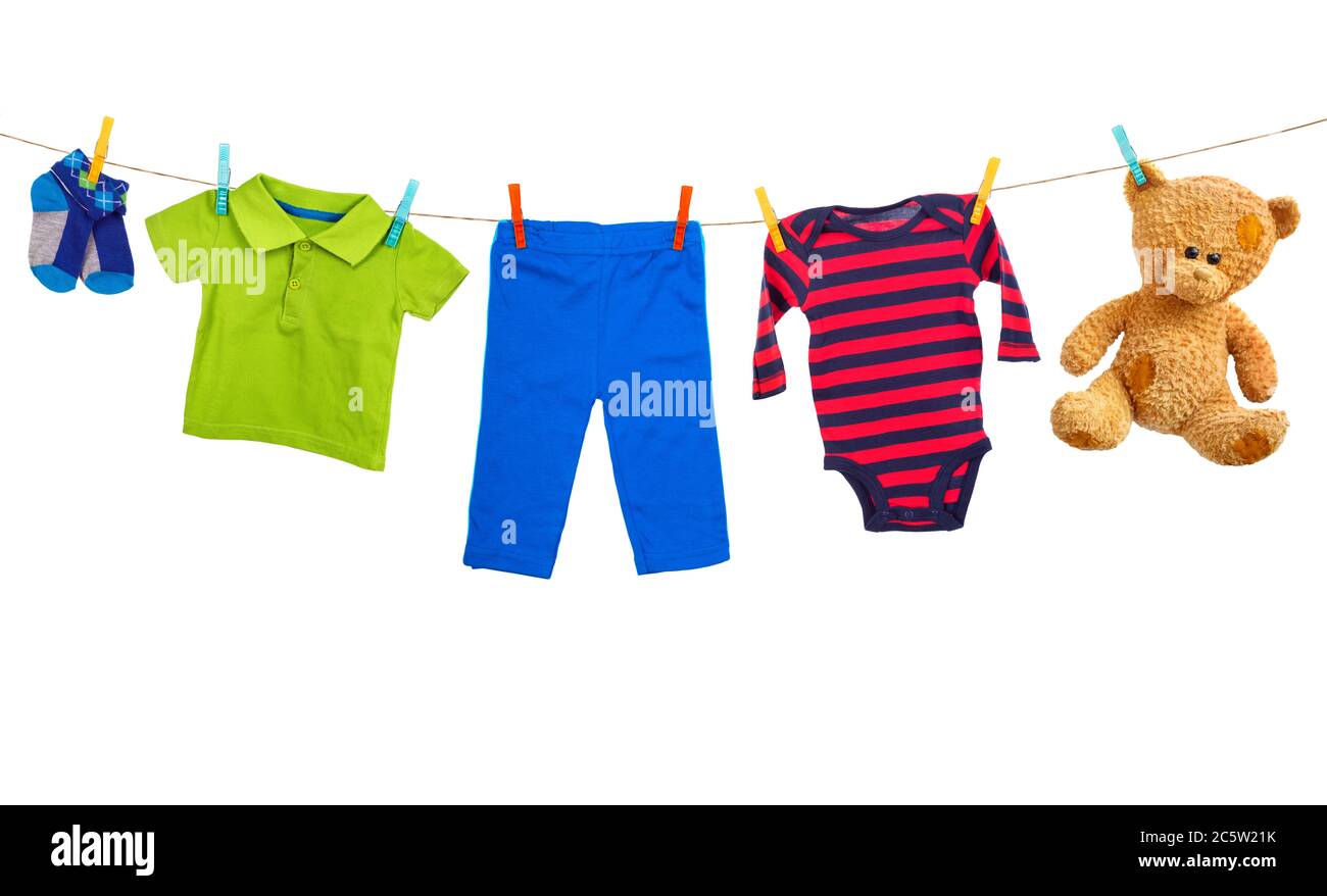 Laundry line with colorful clothes on a white background Stock Photo ...