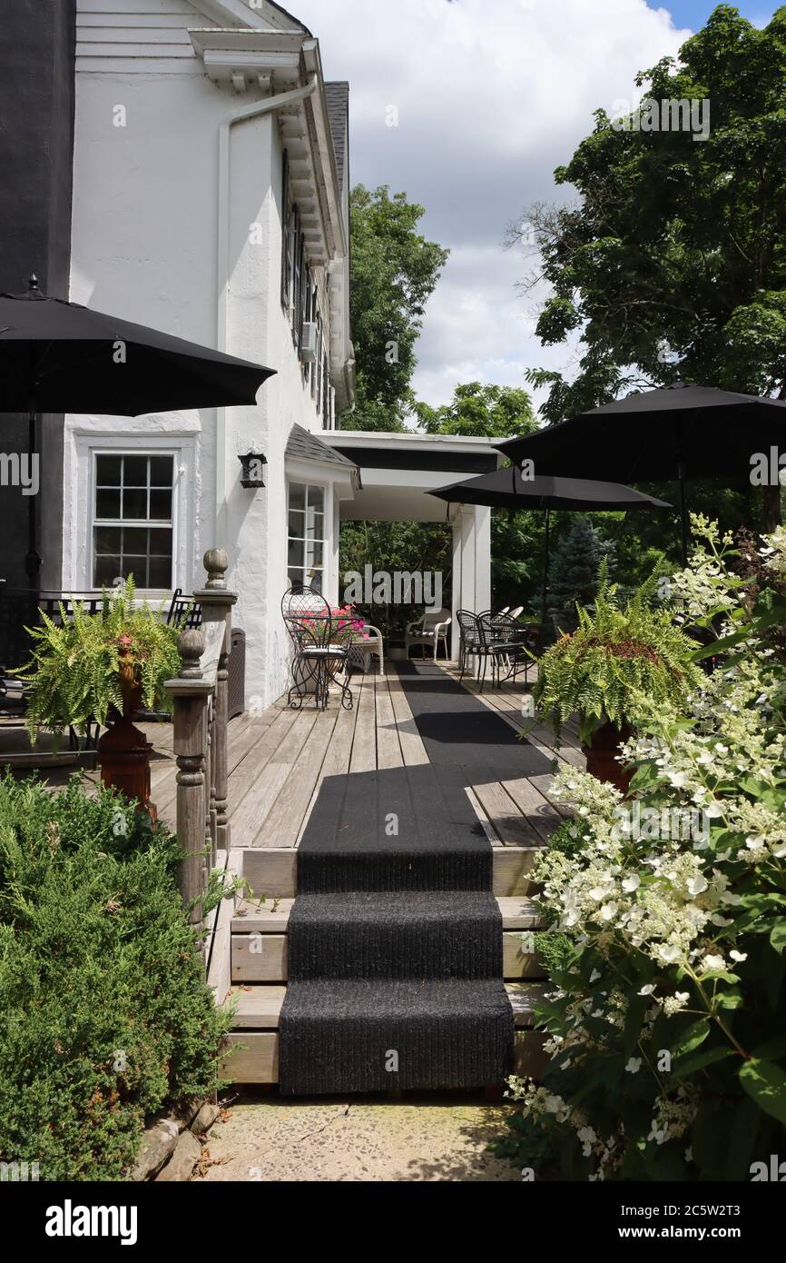 This is the side view of the house and patio Stock Photo - Alamy