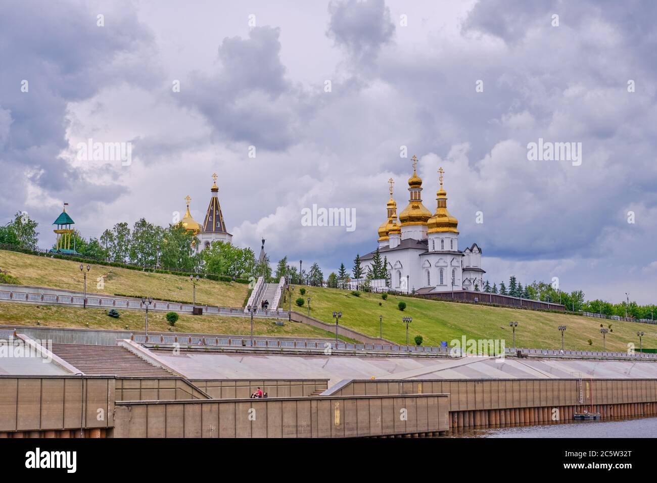 Tyumen, Russia - 24 june, 2020: View from Tura river to embankment and ...