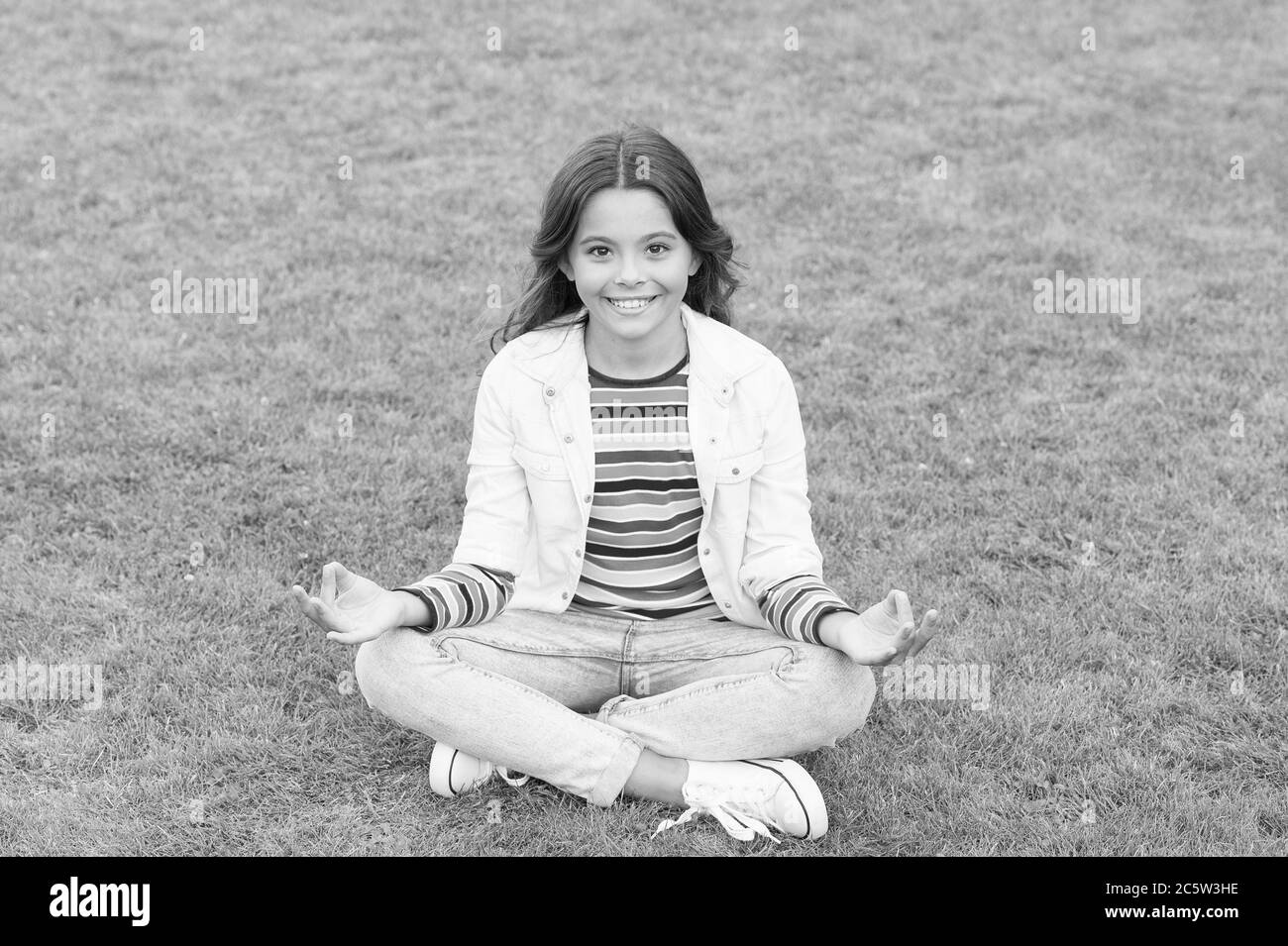 Peace of mind. School break for rest. Adorable pupil. Girl kid sit on ...