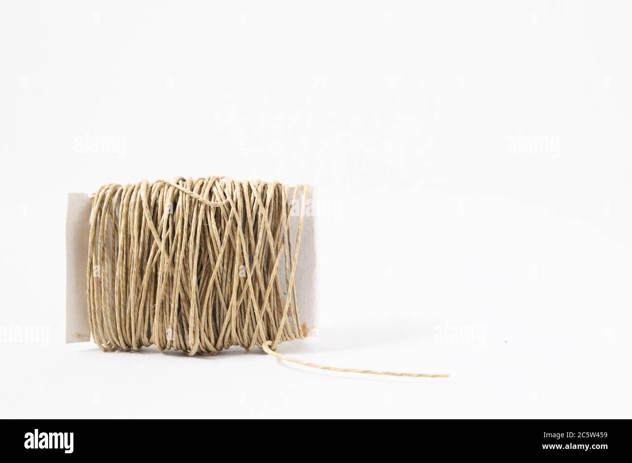 Roll of Twine isolated on a White Background Stock Photo - Alamy