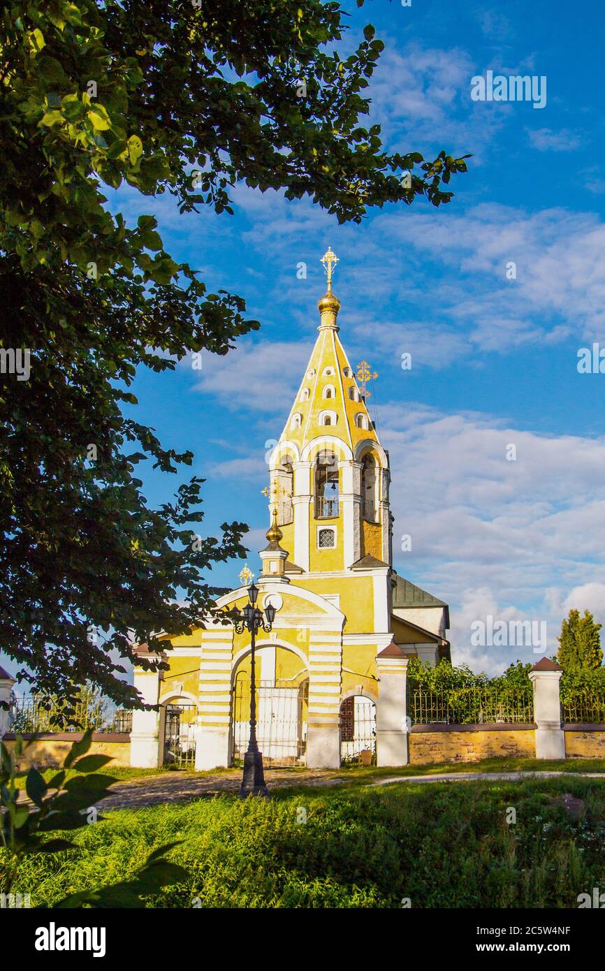 Beautiful christian church with golden domes among green trees Stock ...