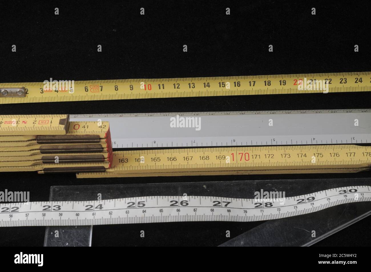 Meter Measurement Method Isolated on a Black Background Stock Photo - Alamy