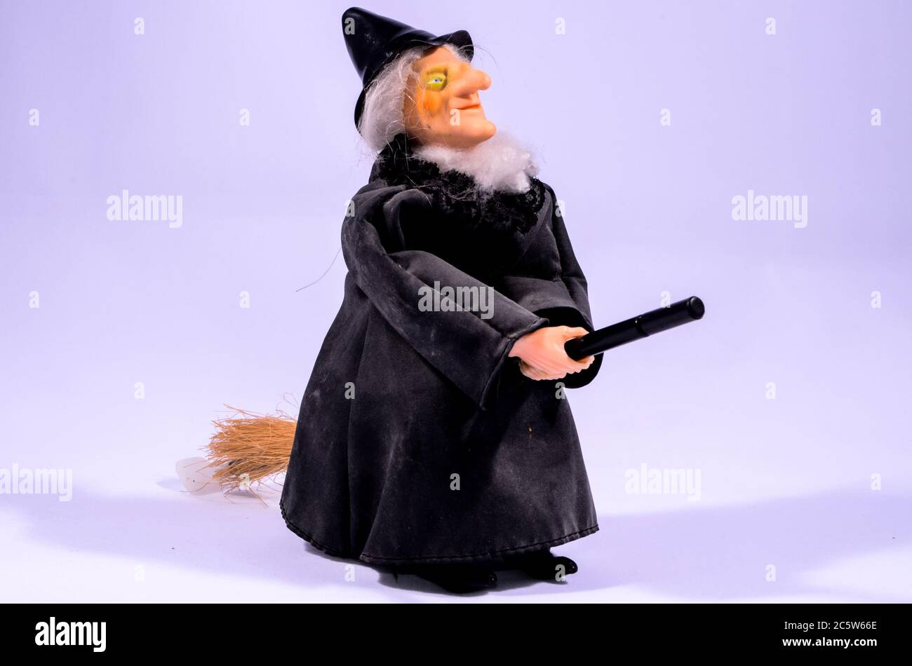 Clay Handmade Statue of a Witch on Black Background Stock Photo - Alamy