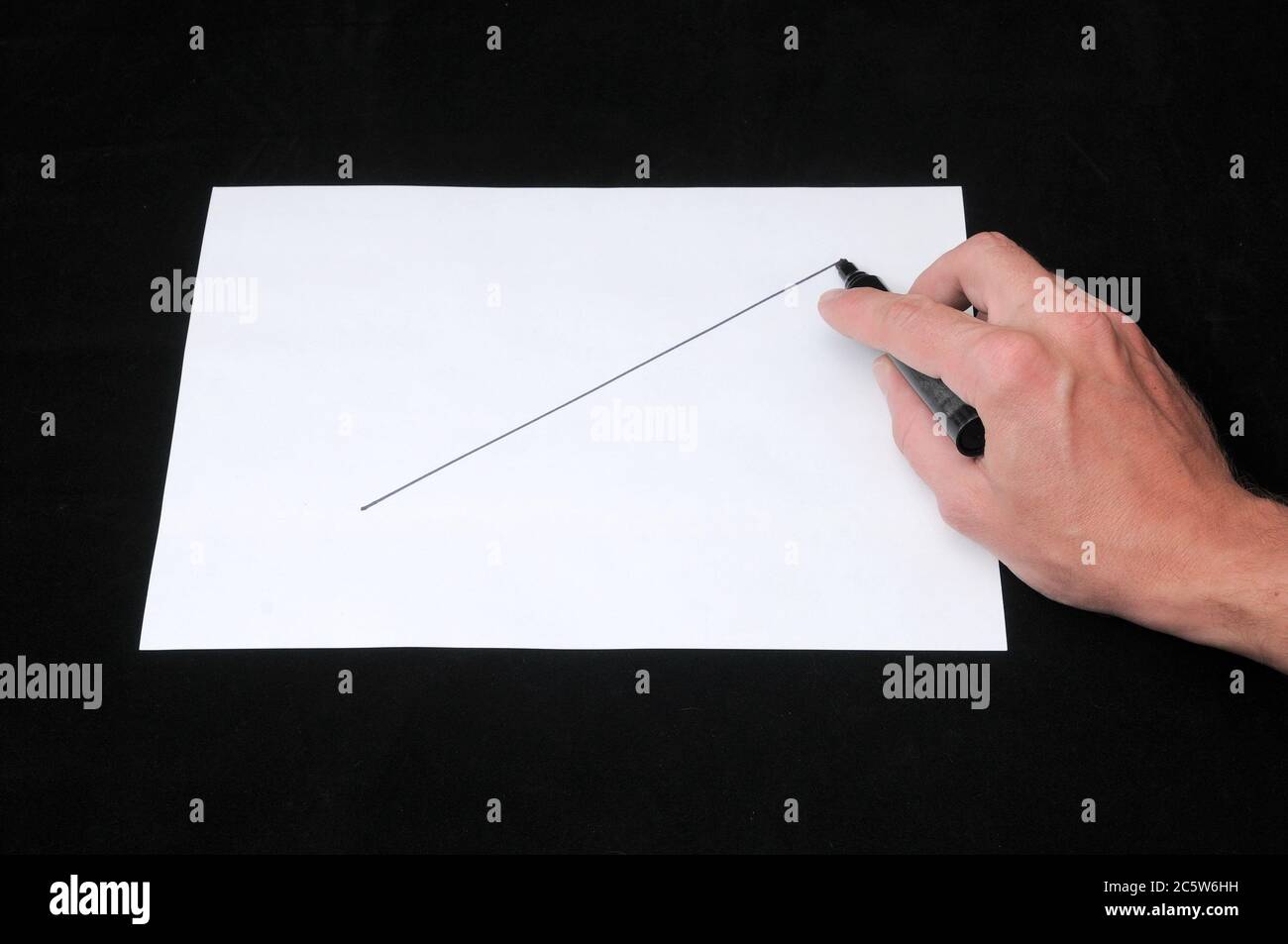 A Caucasian Male Hand Drawing on a White Paper Stock Photo - Alamy