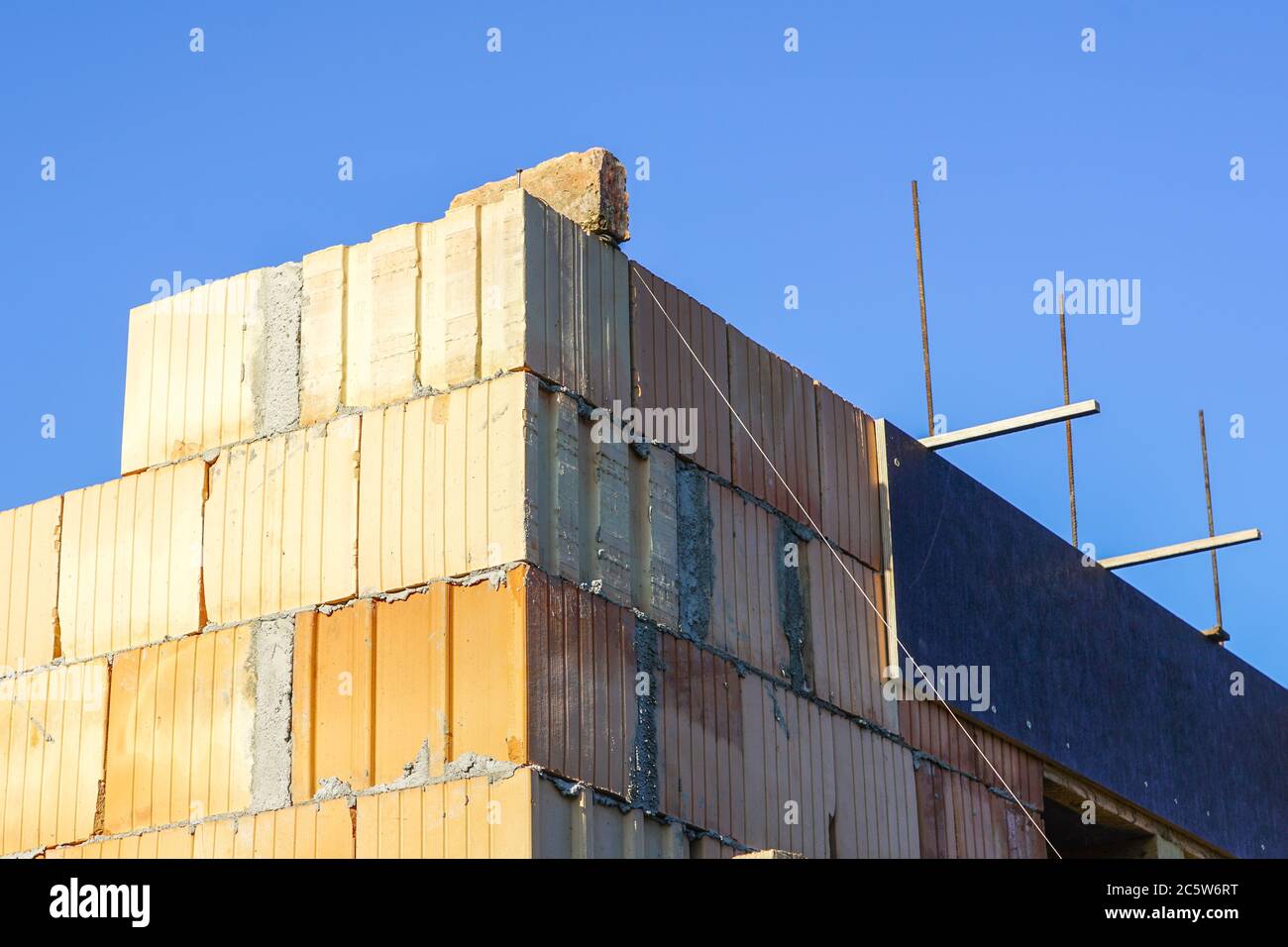 view of the corner of a new building, built from building blocks on a ...