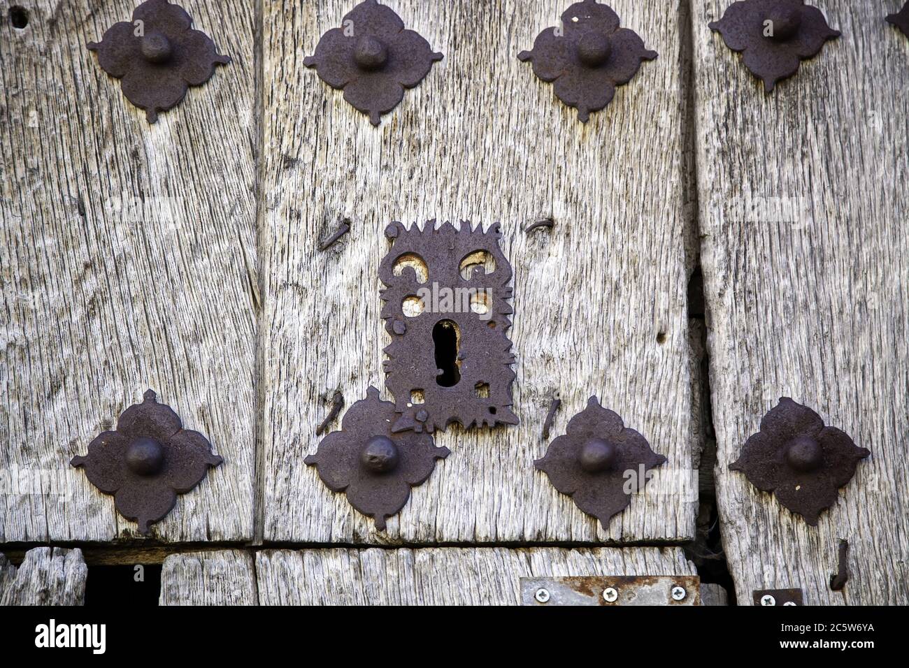 Old lock on a wooden door, security detail Stock Photo - Alamy