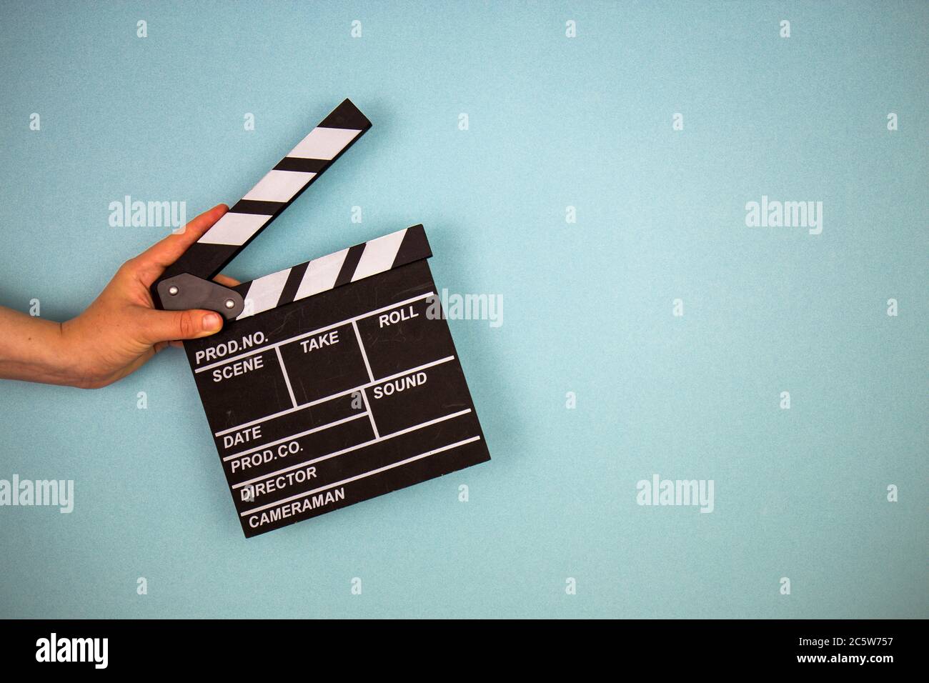 Movie clapper on blue background, cinema concept Stock Photo - Alamy