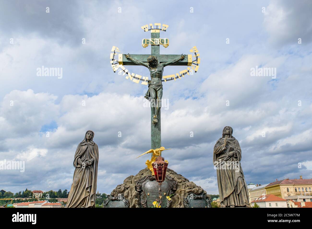The statue Crucifix and Calvary on Charles Bridge in Prague, Czech ...
