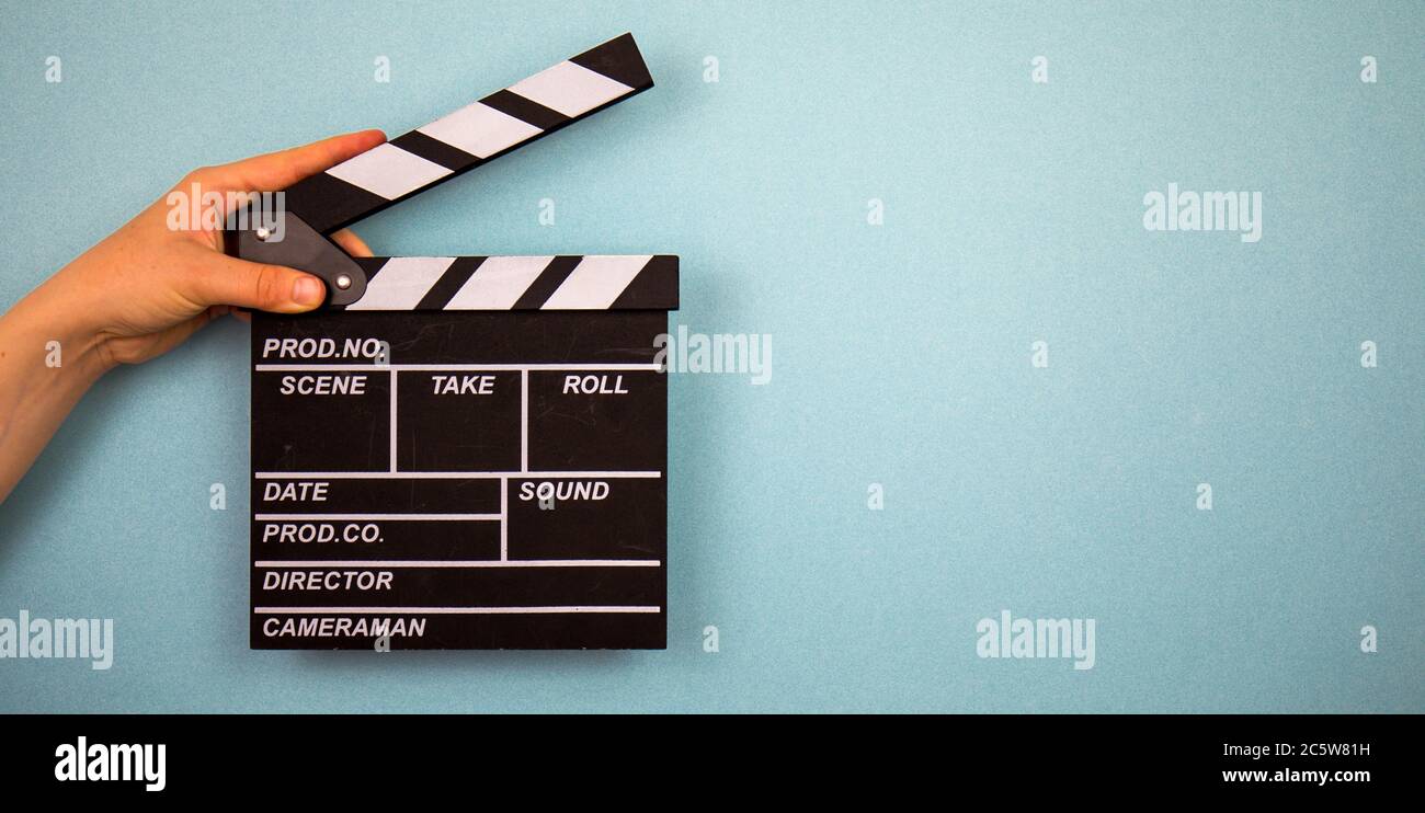 Movie clapper on blue background, cinema concept Stock Photo - Alamy