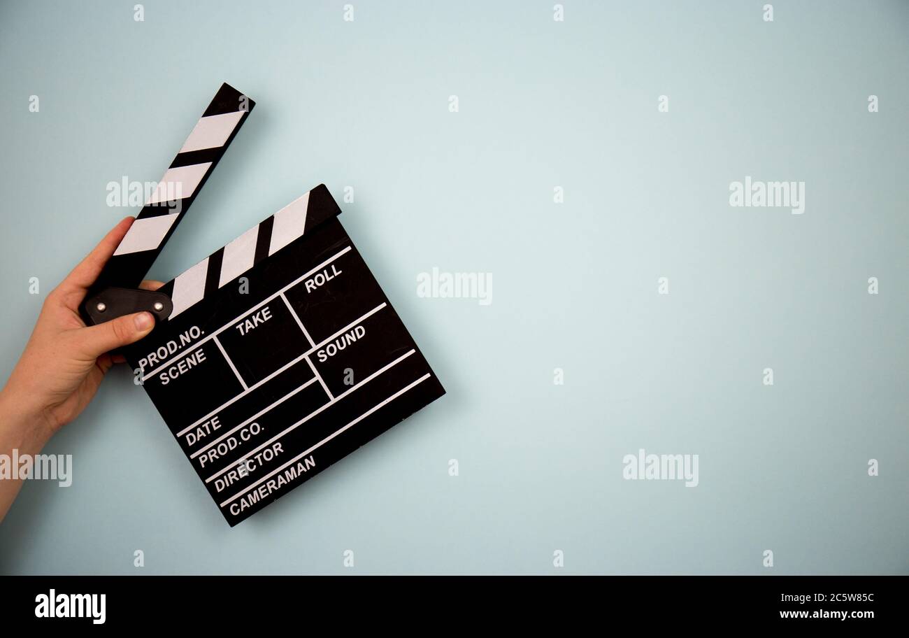 Movie clapper on blue background, cinema concept Stock Photo - Alamy