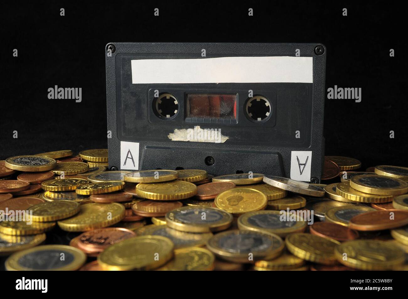 Money and Music Concept Tape Musicassette and Coins Stock Photo - Alamy