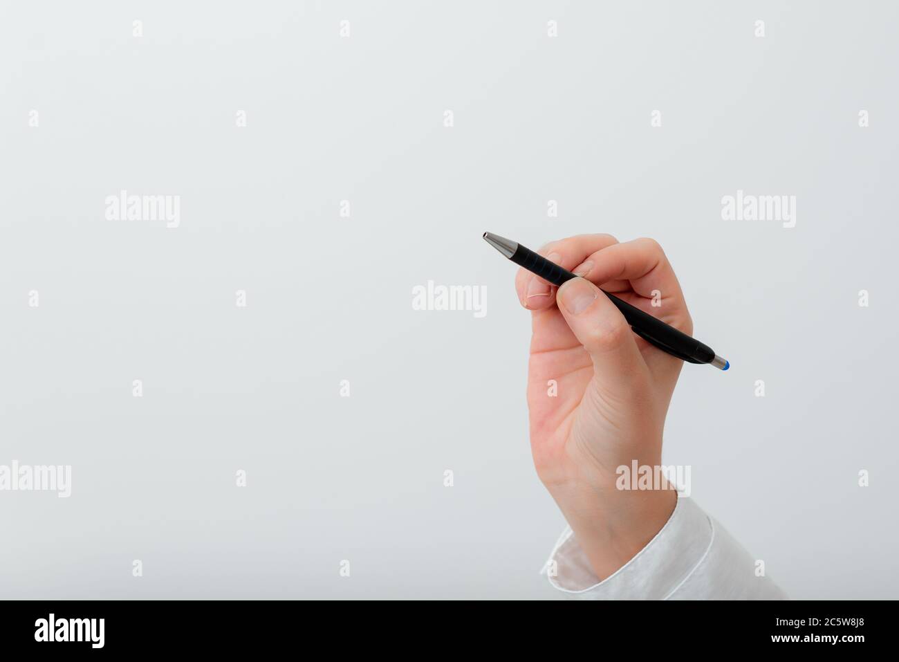 Model Displaying Different Shots of Holding Pen Ready For Promotional ...