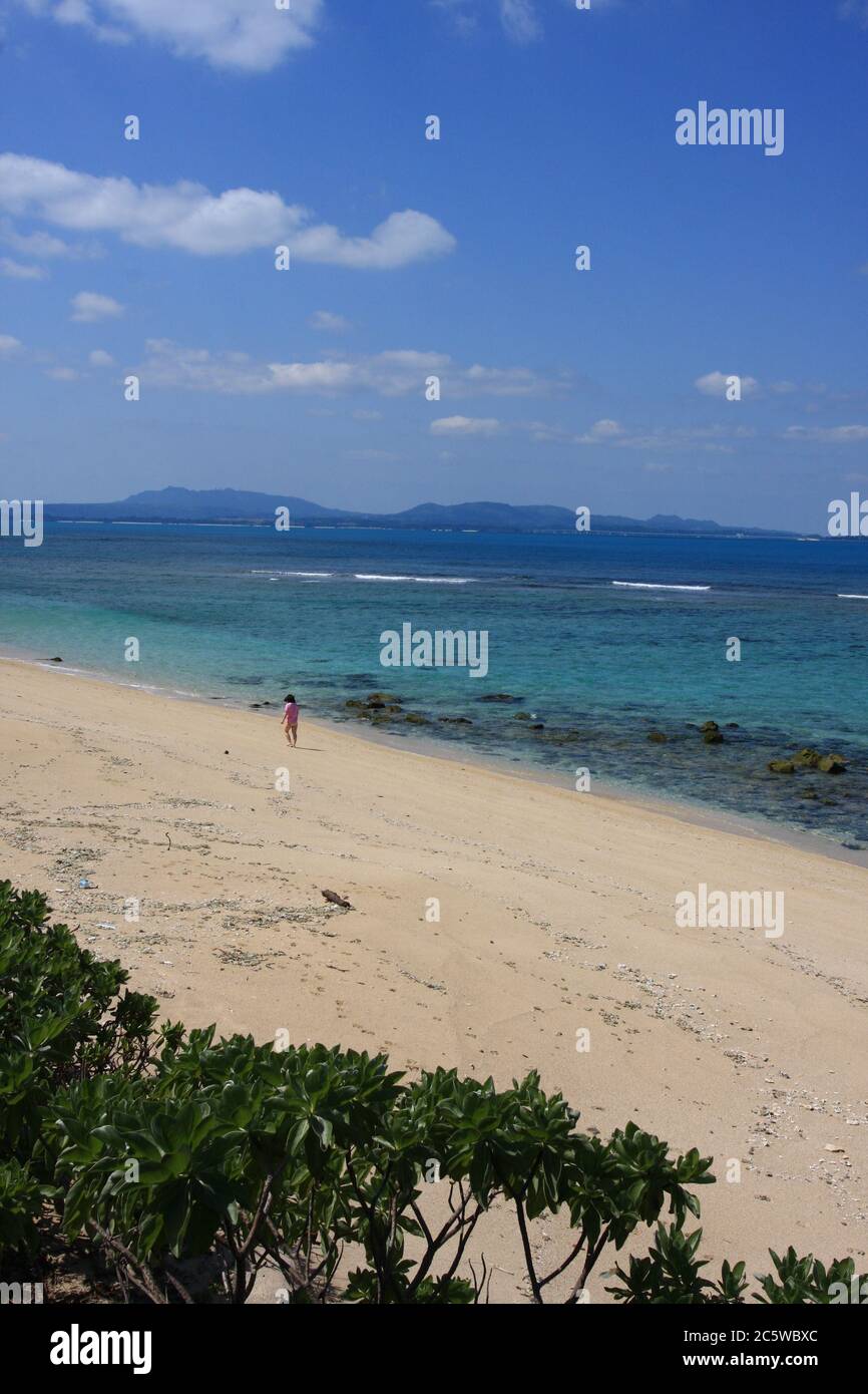 Beach sand & blue ocean sea scenes at Okinawa, Japan Stock Photo - Alamy