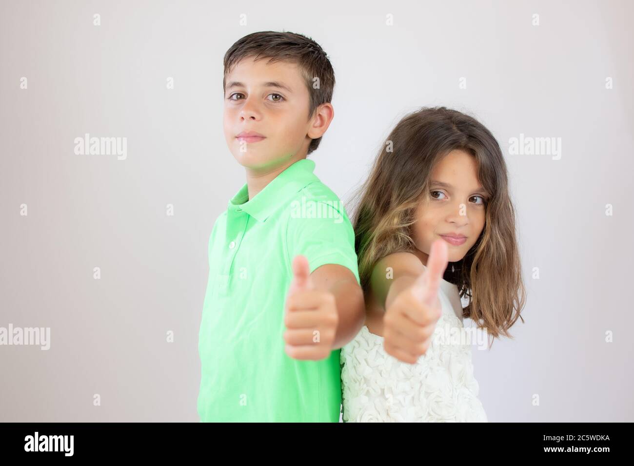 Two friends making funny gestures Stock Photo - Alamy