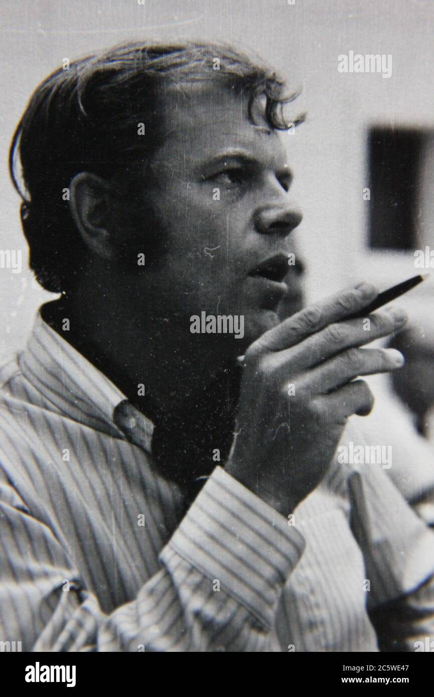 Fine 70s vintage black and white lifestyle professional man on the job ...