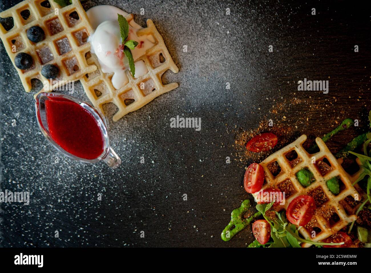 Fresh baked sweet and salty Belgian waffles, top down view. Savory ...