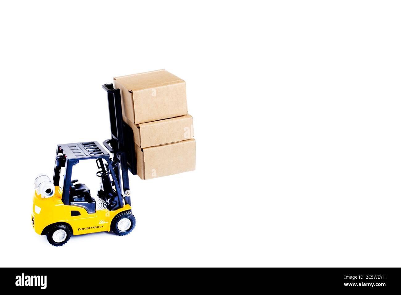 Mini forklift truck load cardboard boxes isolated on white background ...