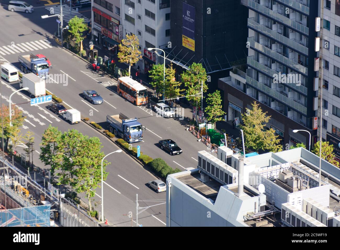 Aerial view of traffic in roads of Tokyo. A aisle in between ...