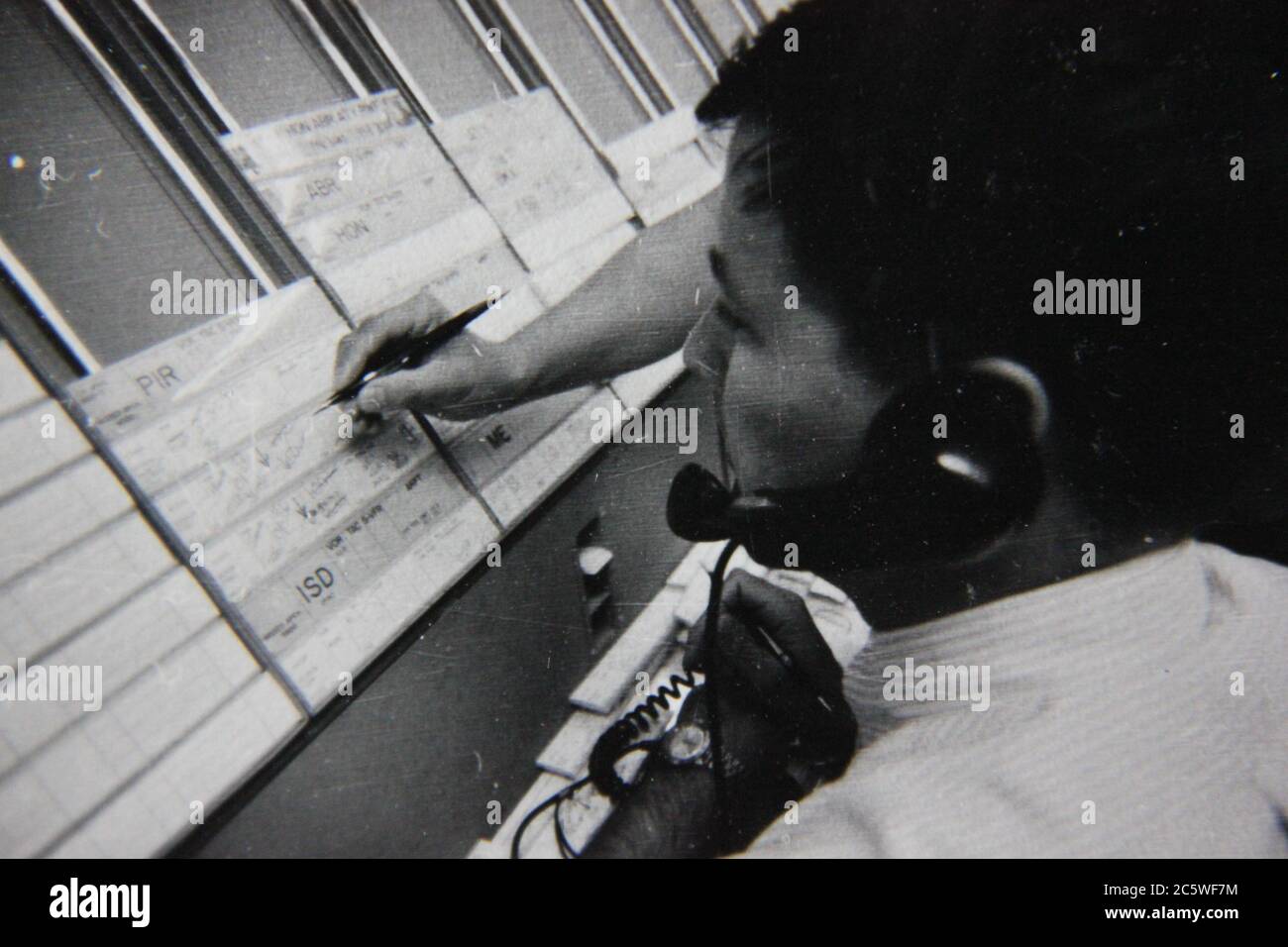 Fine 70s vintage black and white lifestyle professional man on the job ...