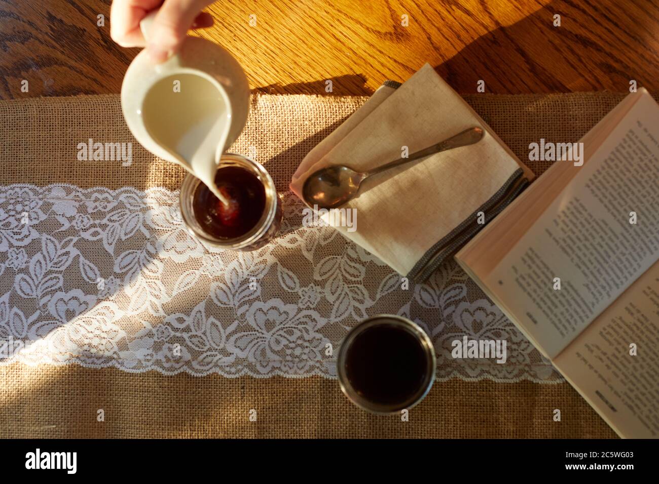 Morning Coffee and Reading Stock Photo - Alamy