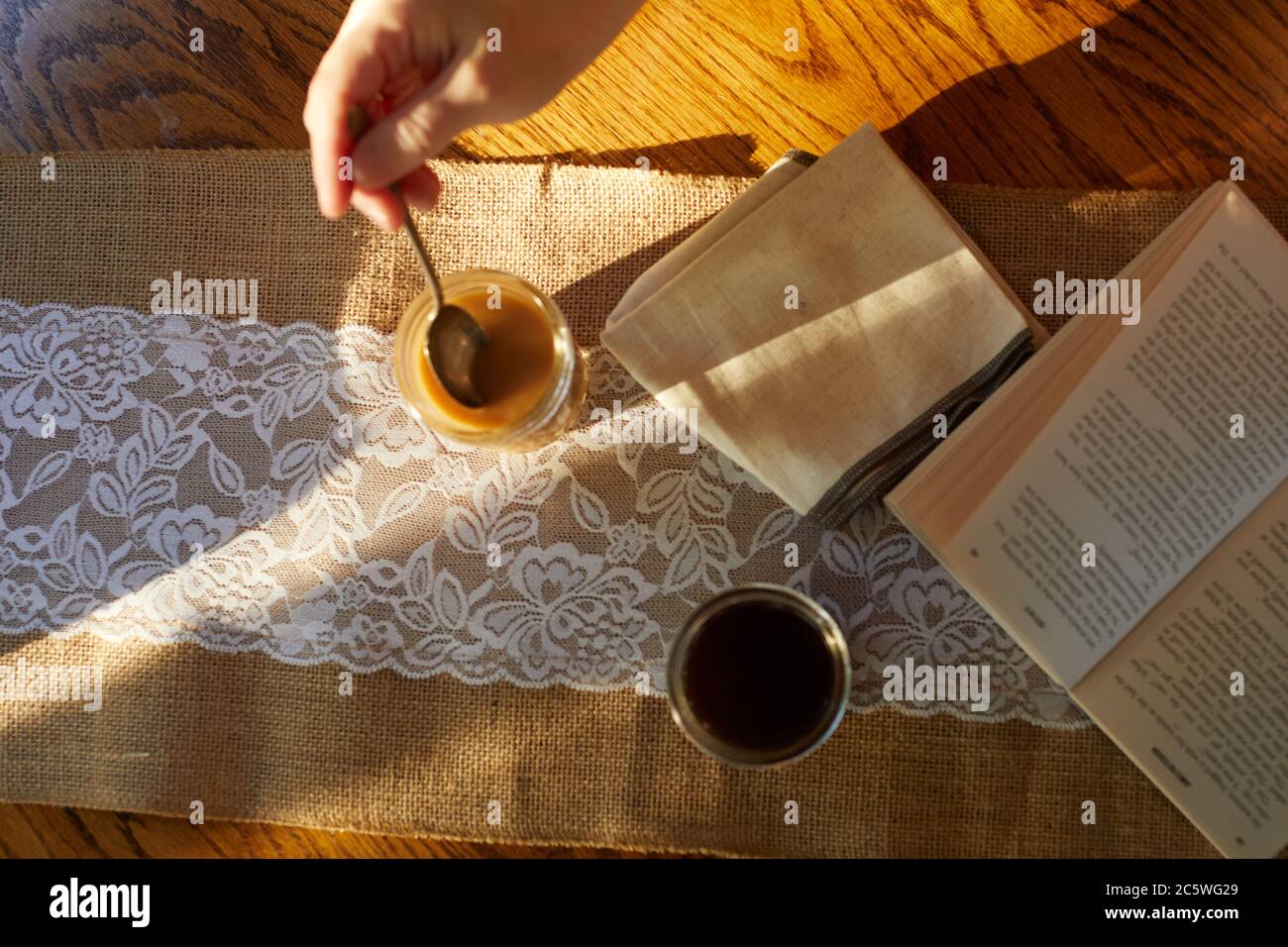 Morning Coffee and Reading Stock Photo - Alamy