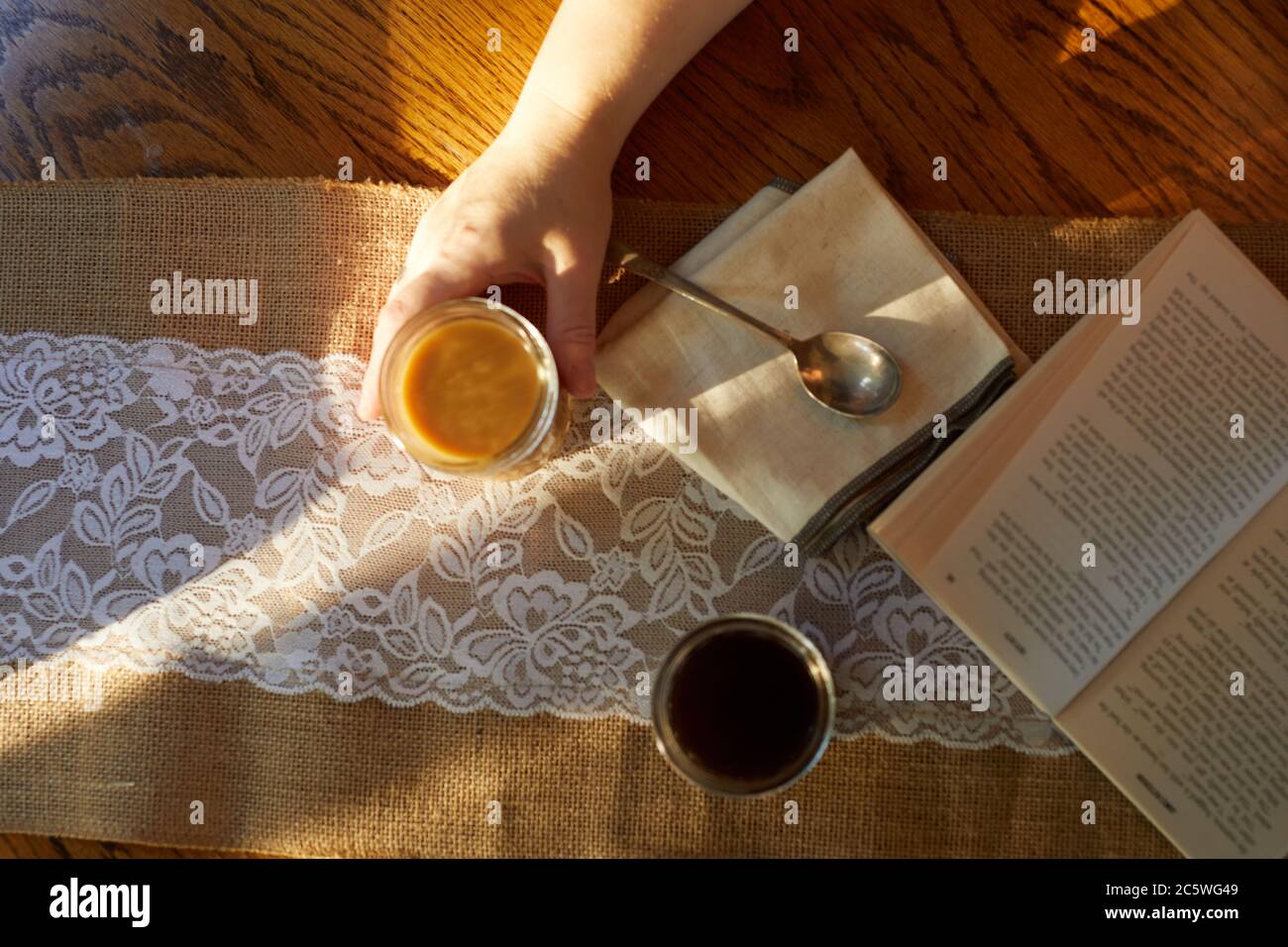 Morning Coffee and Reading Stock Photo - Alamy