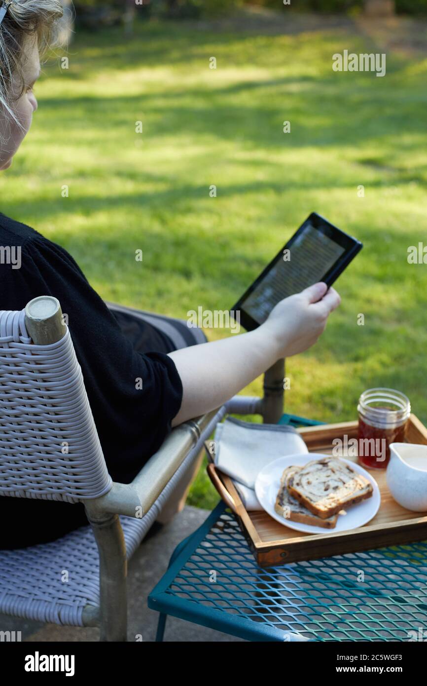 Morning Coffee and Reading Stock Photo - Alamy