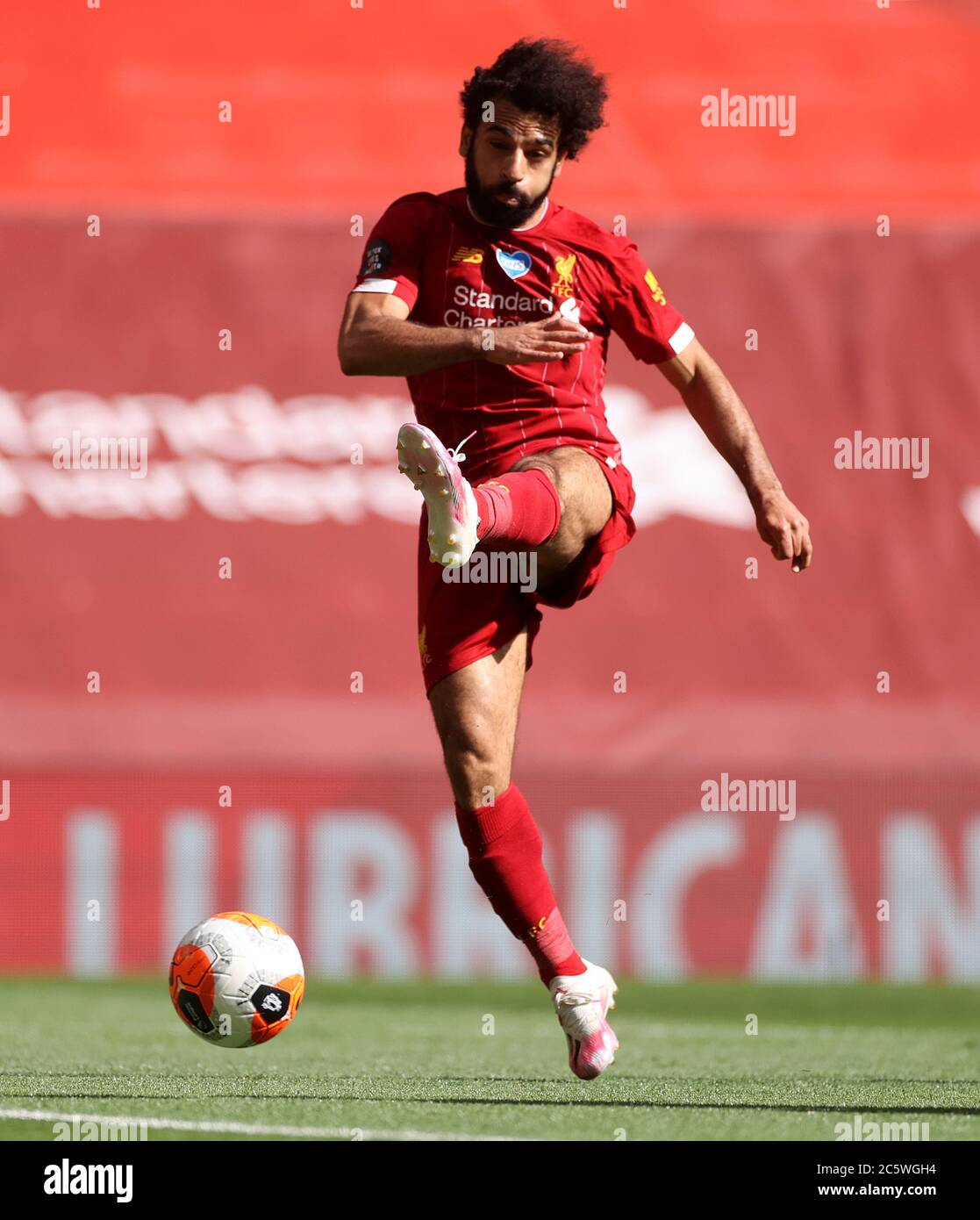 Liverpool's Mohamed Salah has a shot at goal during the Premier League ...