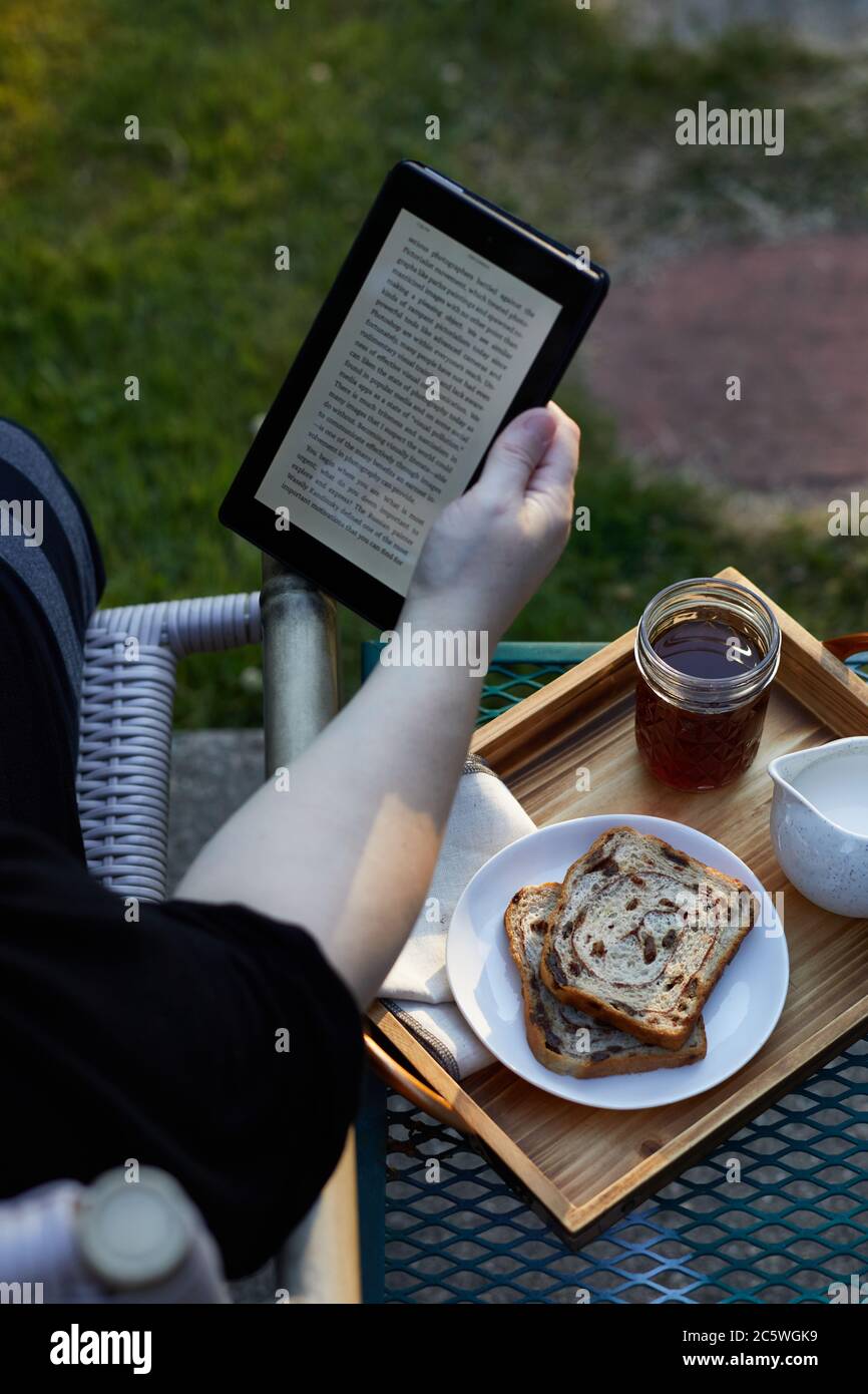 Morning Coffee and Reading Stock Photo - Alamy