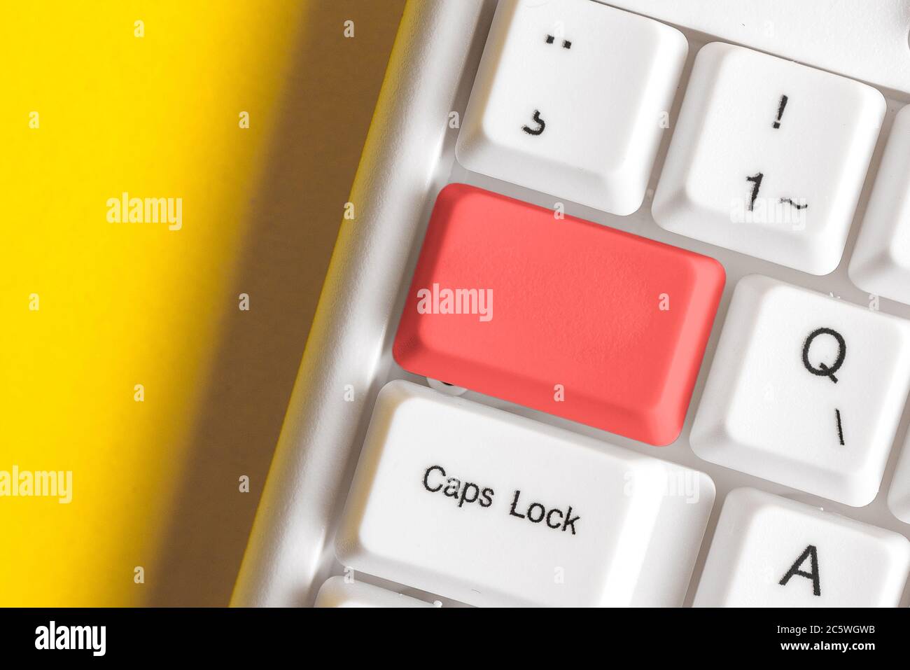 Different Colored Keyboard key With Accessories Arranged On Empty copy ...