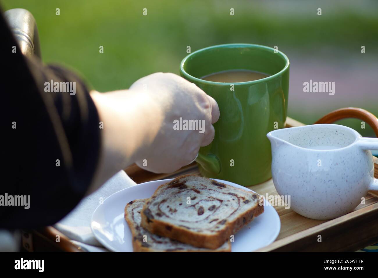 Morning Coffee and Reading Stock Photo - Alamy
