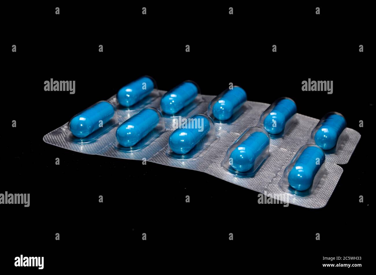 Blue Medication Capsules In Blister Pack Close-up Stock Photo - Alamy