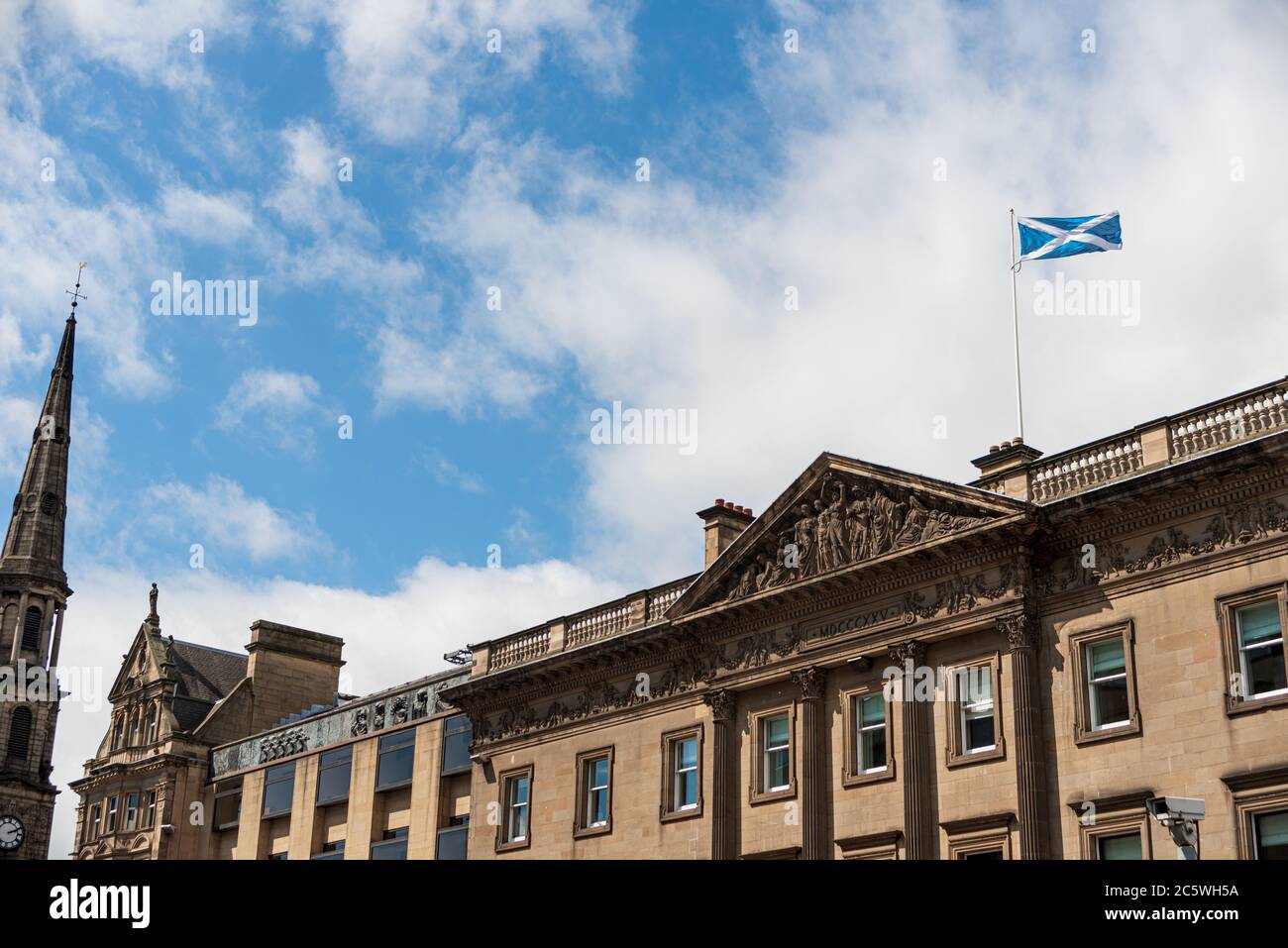 Scottish flag on a government building in Edinburgh Stock Photo - Alamy