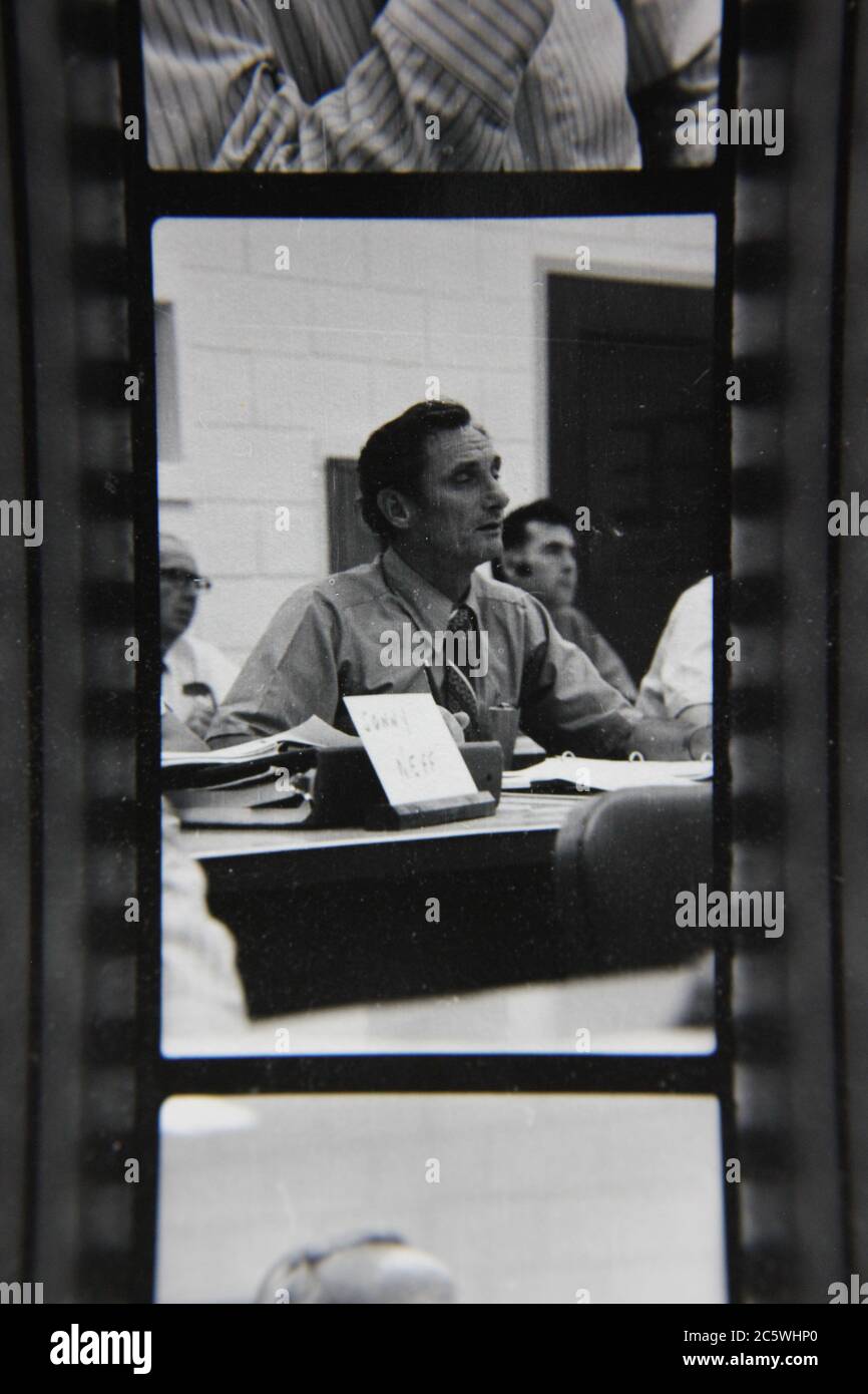 Fine 70s vintage black and white lifestyle professional man on the job ...