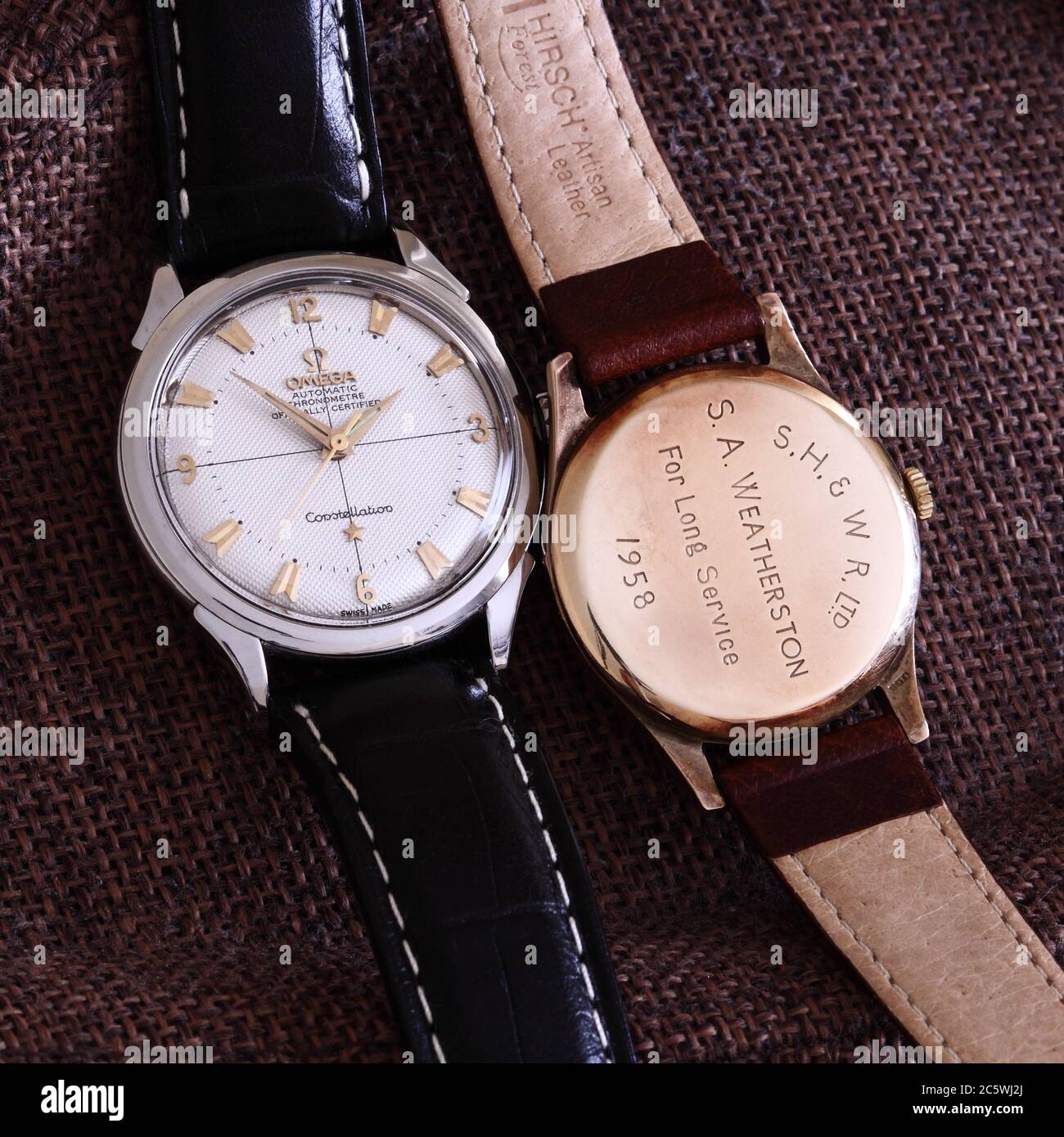 Omega Constellation and engraved gold retirement watch Stock Photo - Alamy