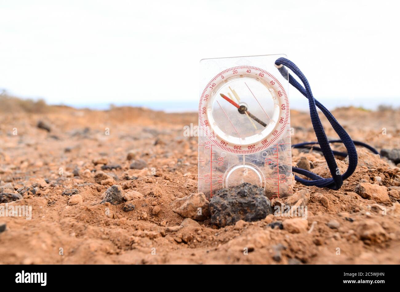 Orientation Concept Metal Compass on a Rock in the Desert Stock Photo ...