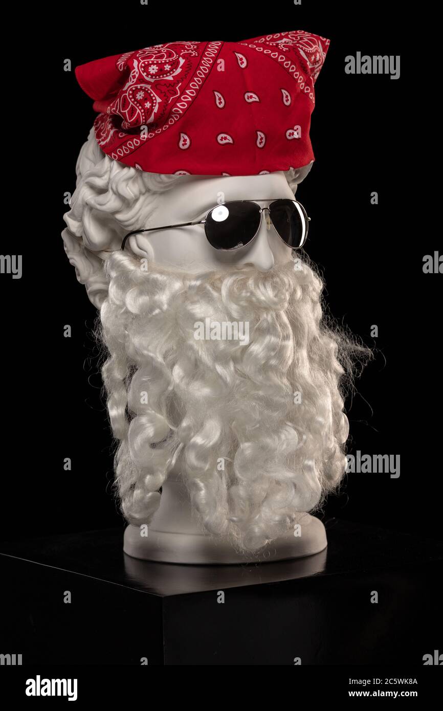 Statue of a bust of Apollo Belvedere with a long white beard in ...