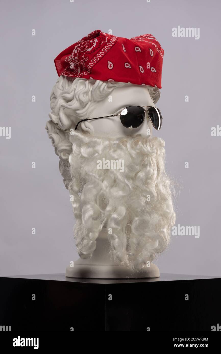 Statue of a bust of Apollo Belvedere with a long white beard in ...