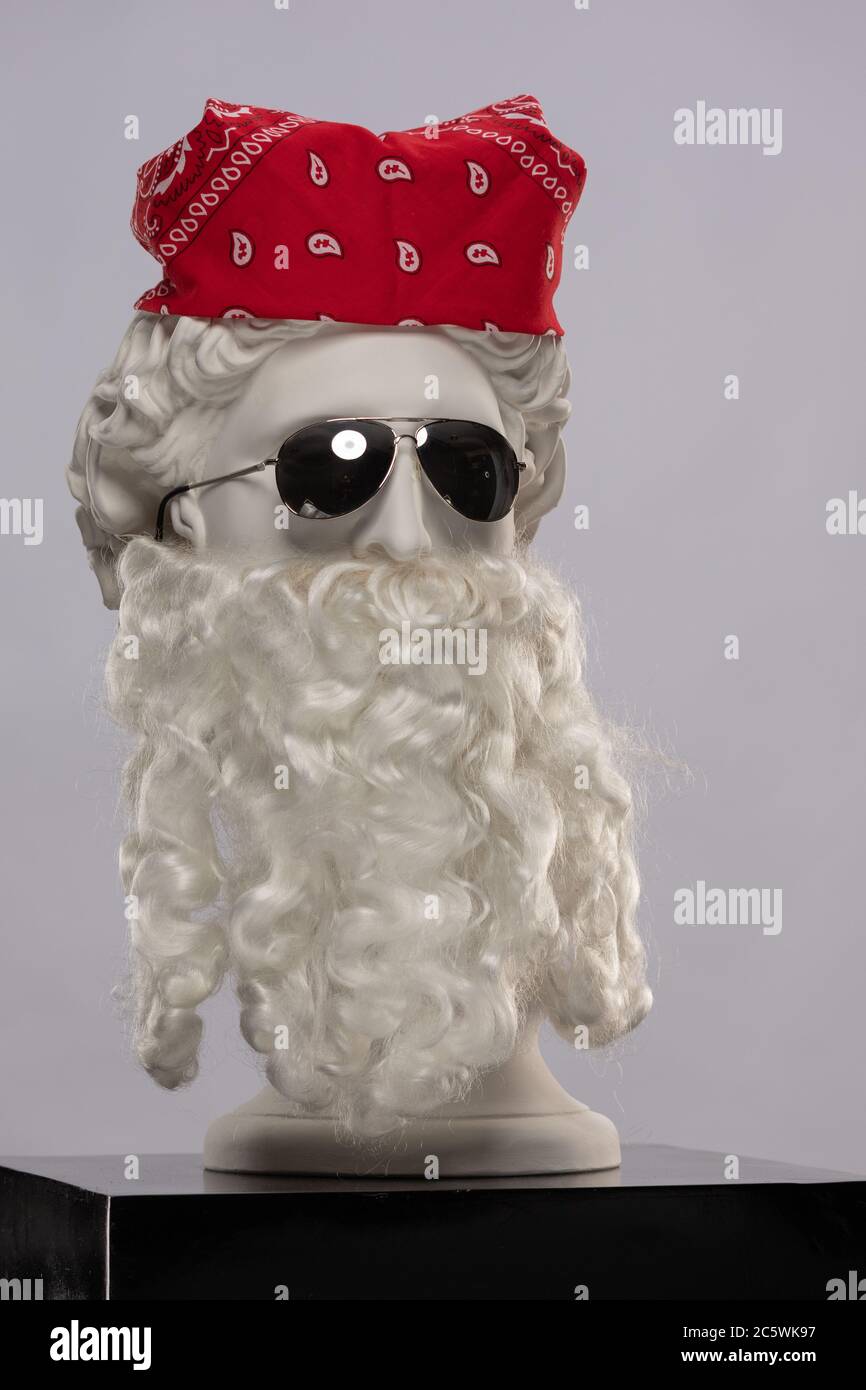 Statue of a bust of Apollo Belvedere with a long white beard in ...