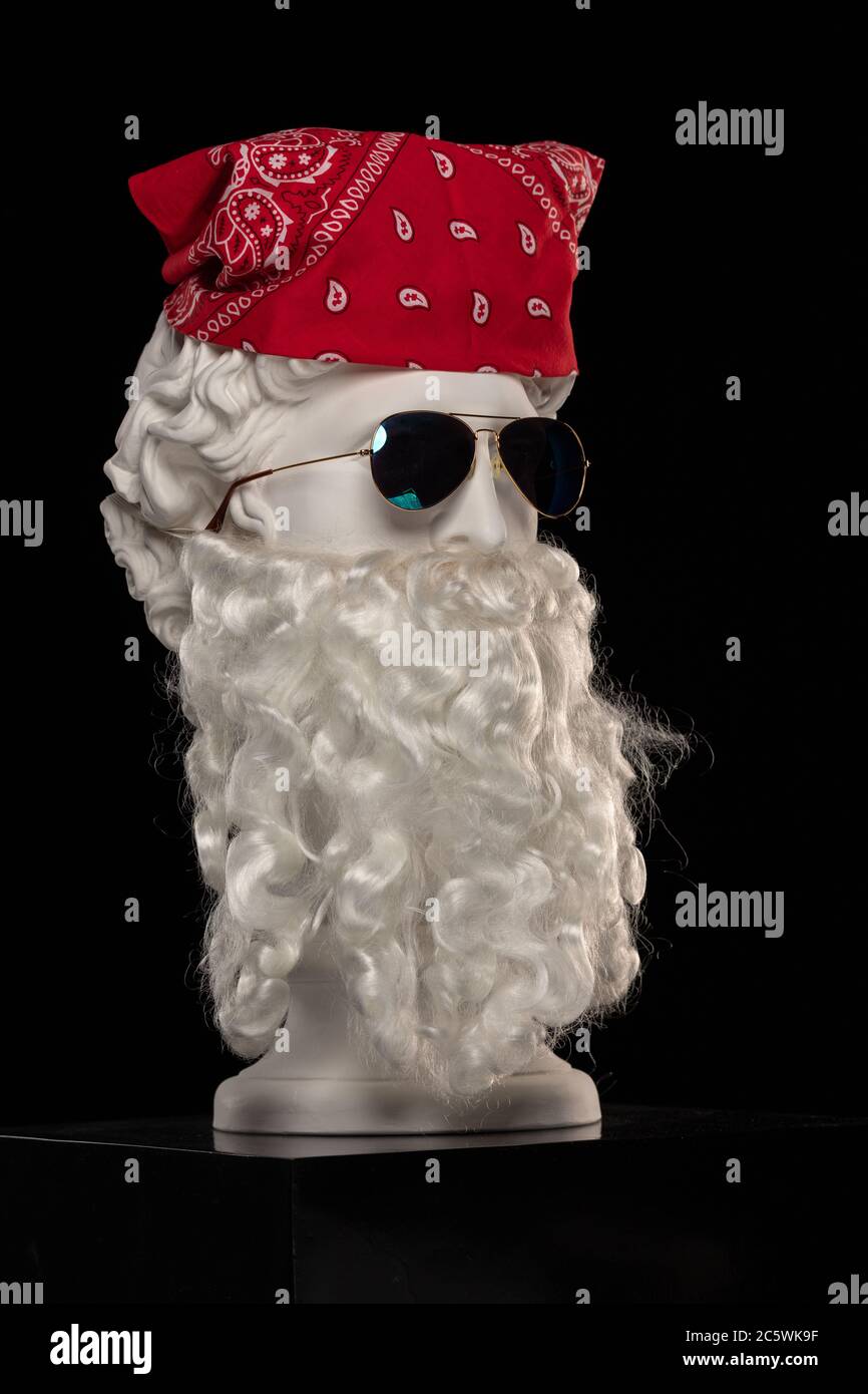 Statue of a bust of Apollo Belvedere with a long white beard in ...