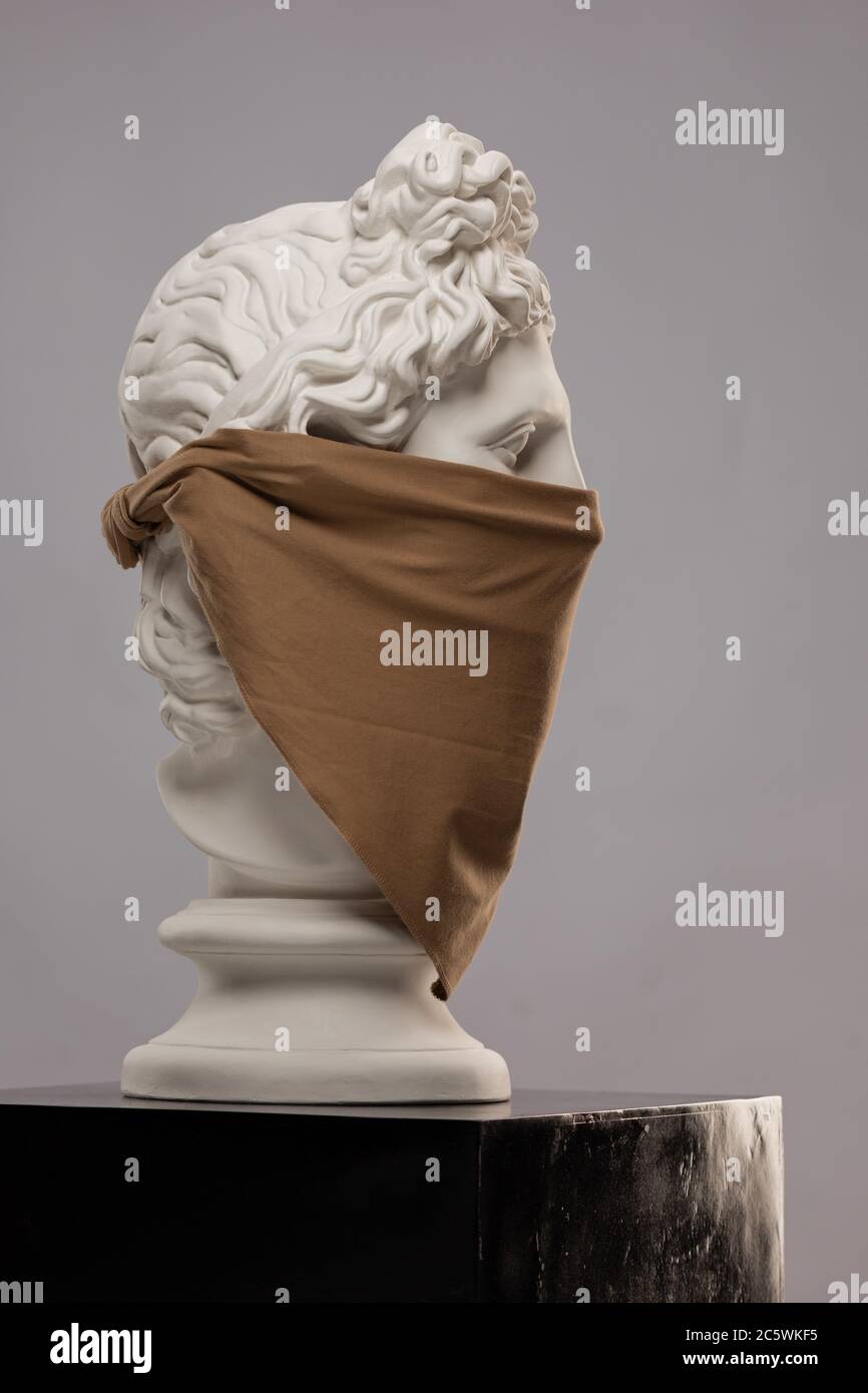 A protective scarf on the face of the statue of Apollo Stock Photo - Alamy