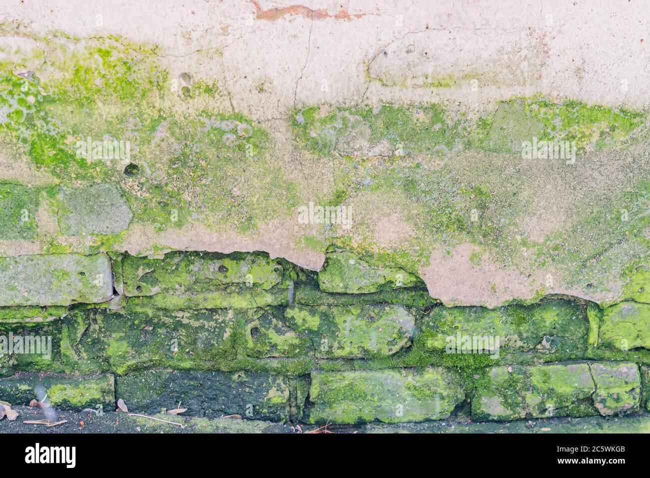 Destroyed Concrete and Brick wall background Stock Photo - Alamy