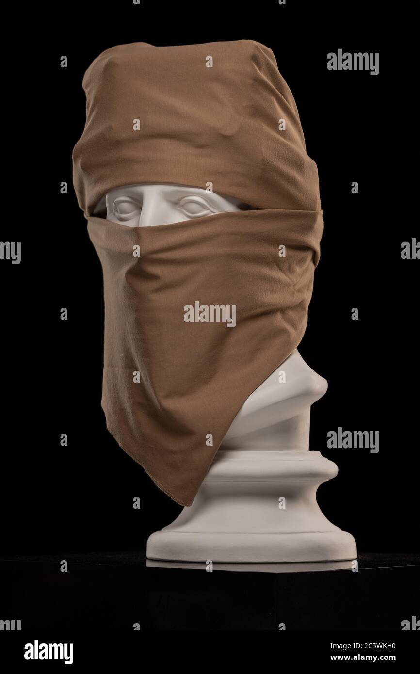 White plaster statue of a bust of Apollo Belvedere in hijab niqab Stock ...