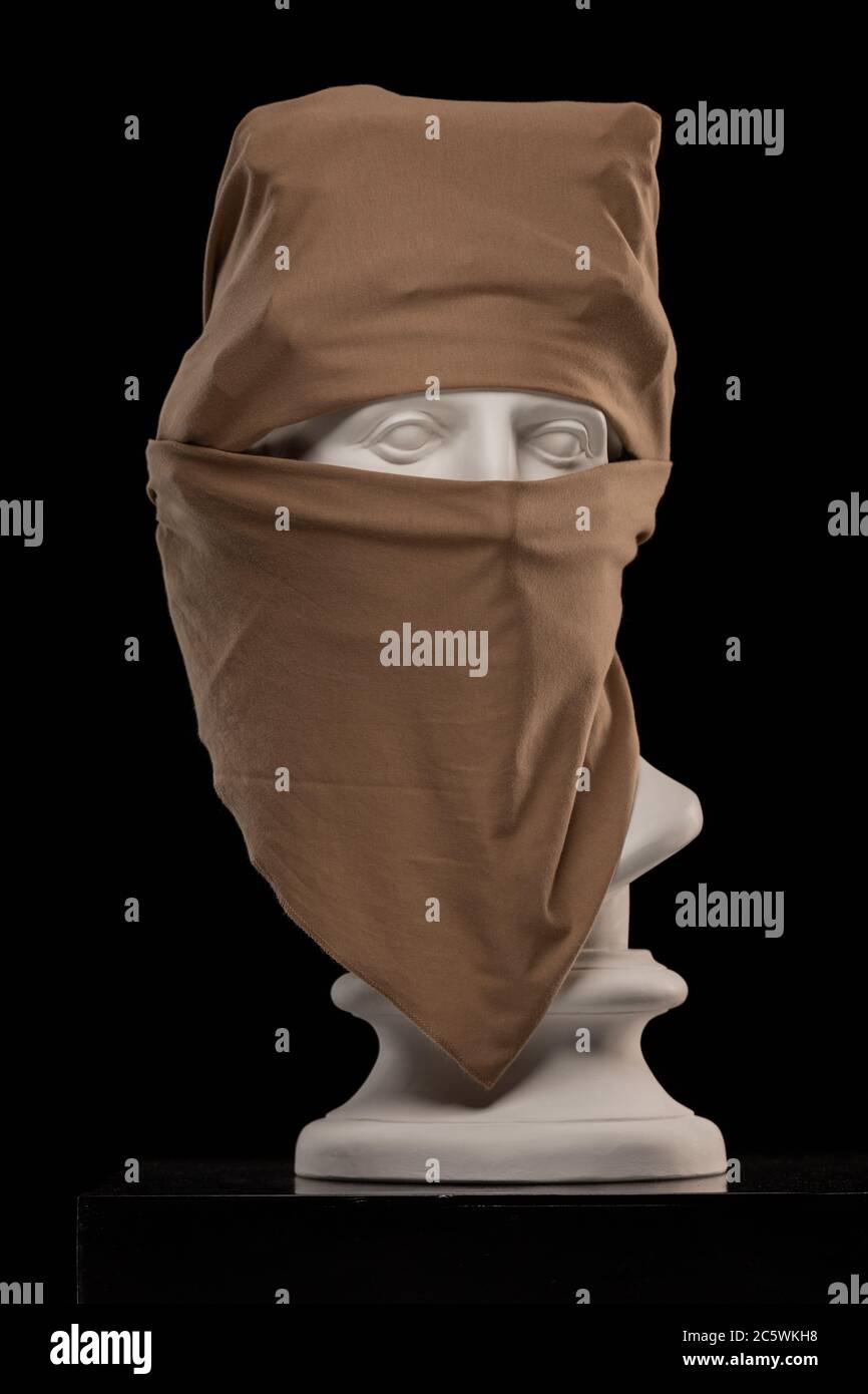 White plaster statue of a bust of Apollo Belvedere in hijab niqab Stock ...