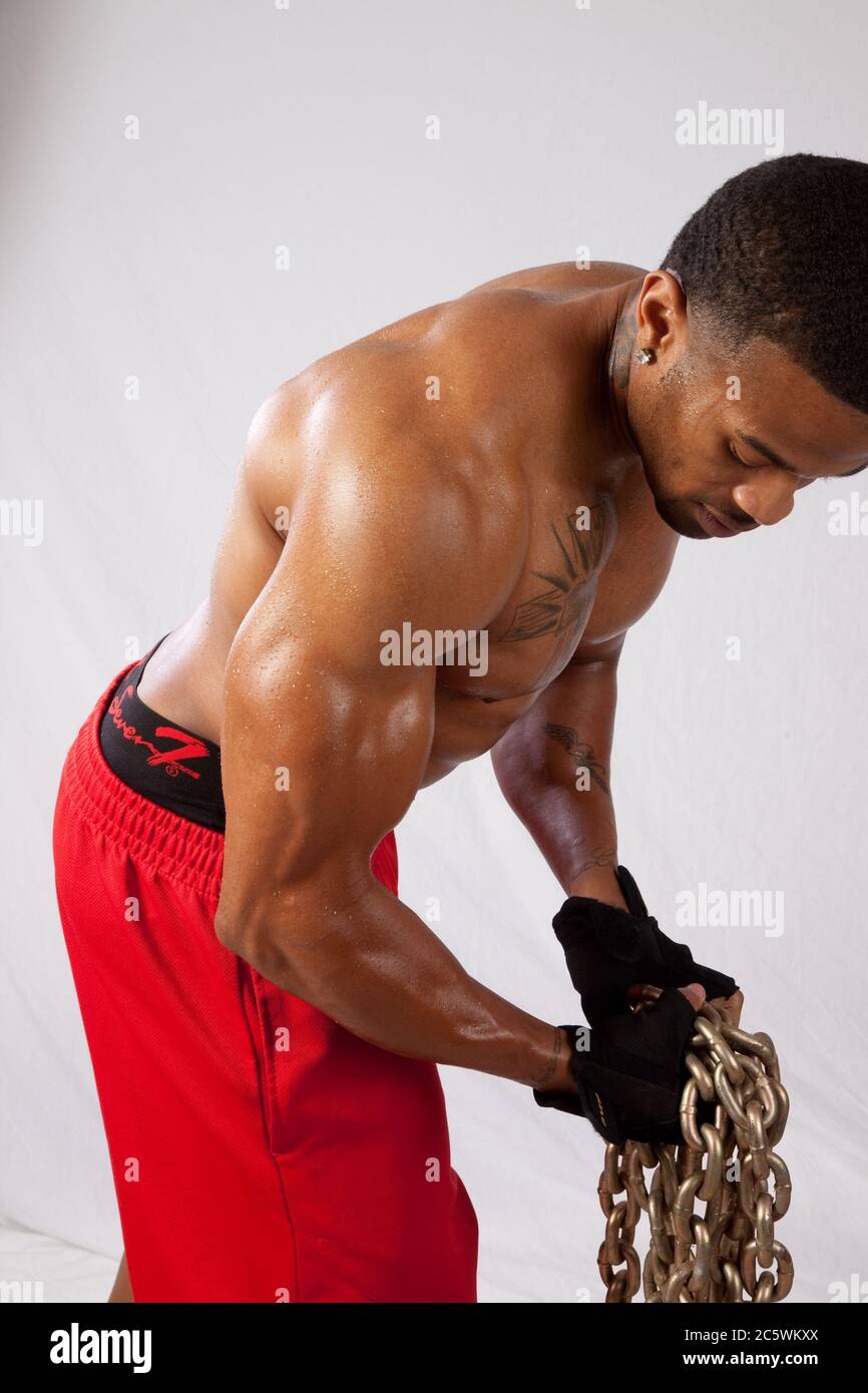 Strong black man with a chain Stock Photo - Alamy