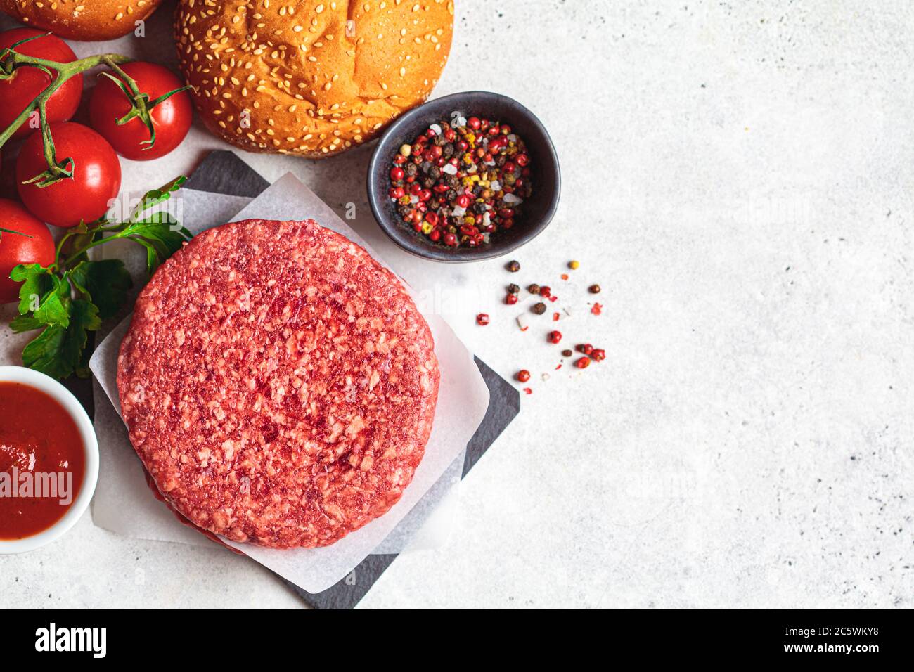 Raw ingredients for burgers, light background, copy space. Cooking ...