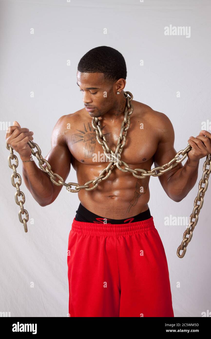 Fit black man with a chain Stock Photo - Alamy